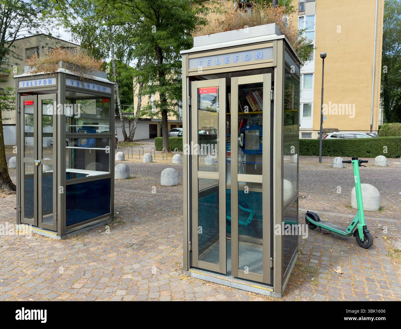 Ljubljana, Slovenia – 16.06.2025: Repurposed retro telephone booths and ...