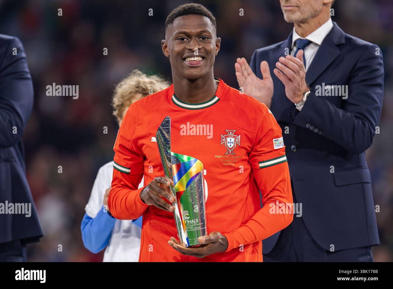 Nuno Mendes of Portugal holds the award for the best player of the ...