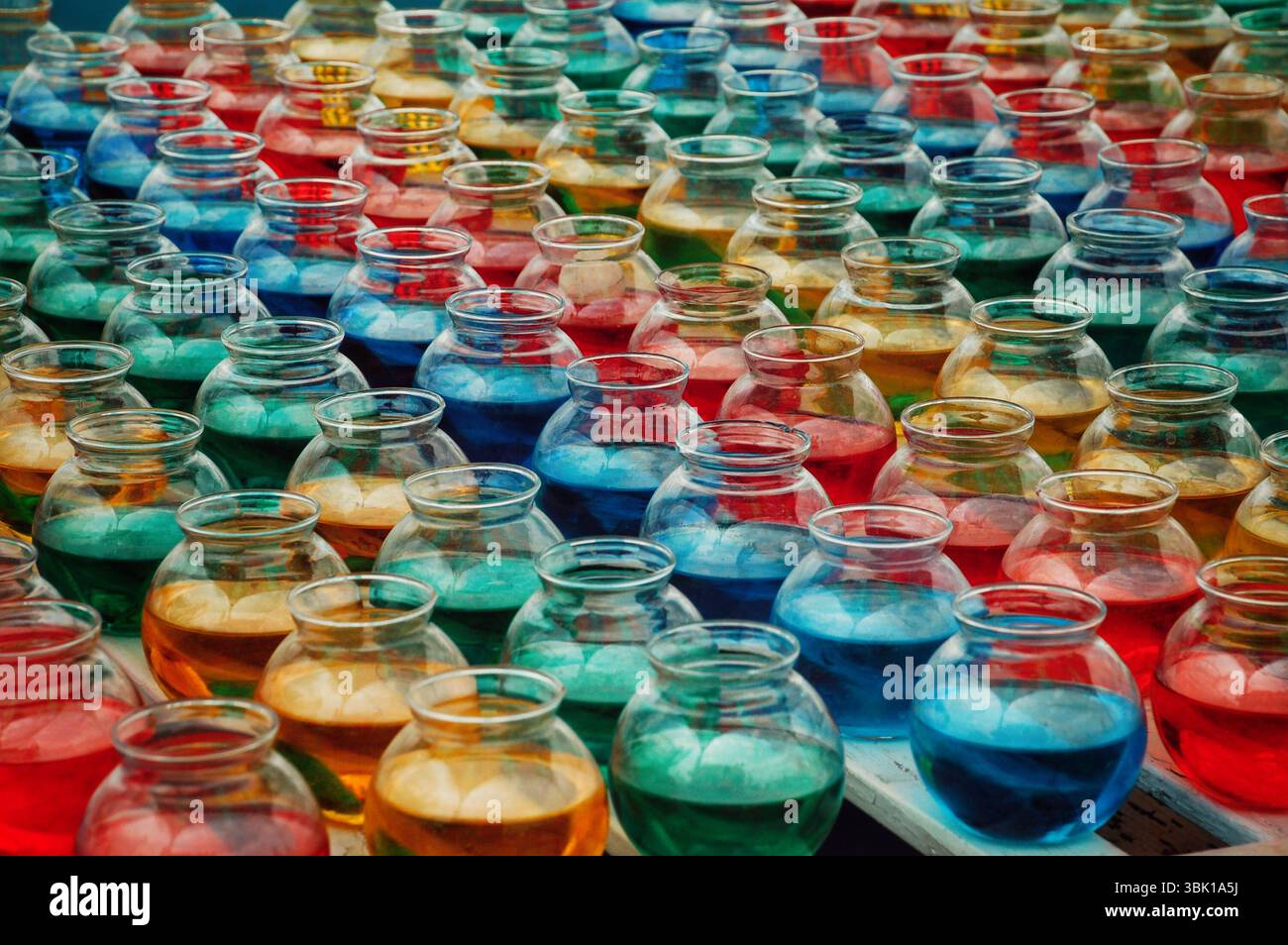 Ping pong toss game at the county fair Stock Photo - Alamy