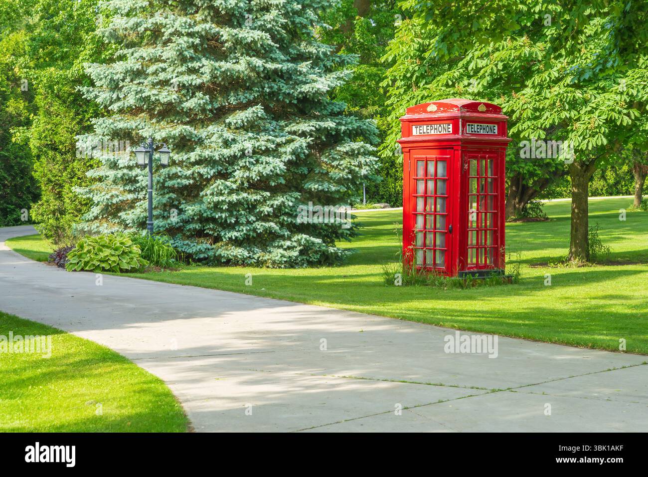 Old iconic British phone booth repurposed as a shelter of children ...