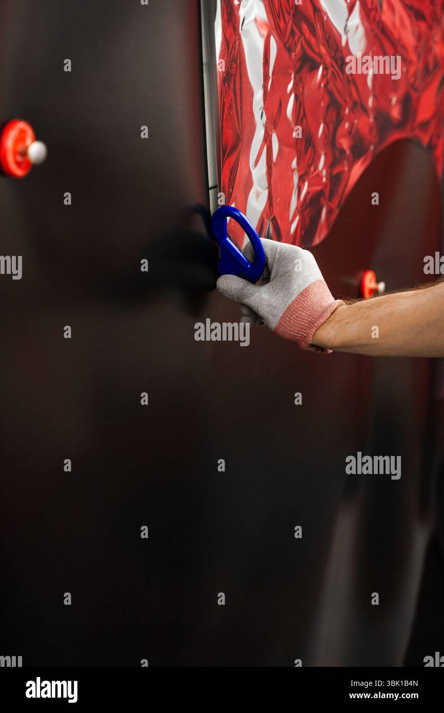 Manual Vinyl Wrap Cutting Using Physical Stencil. Vinyl wrap is ...