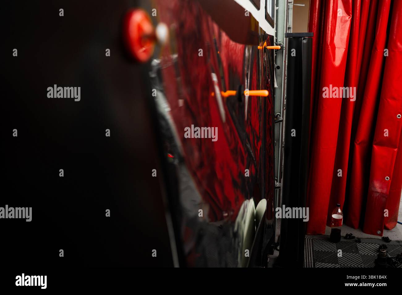 Vinyl wrap is manually cut using stencil over the film for precise ...