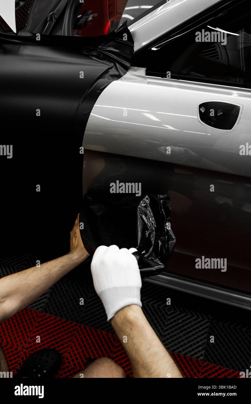 Full Panel Car Vinyl Wrapping. Large-scale vinyl wrap installation ...