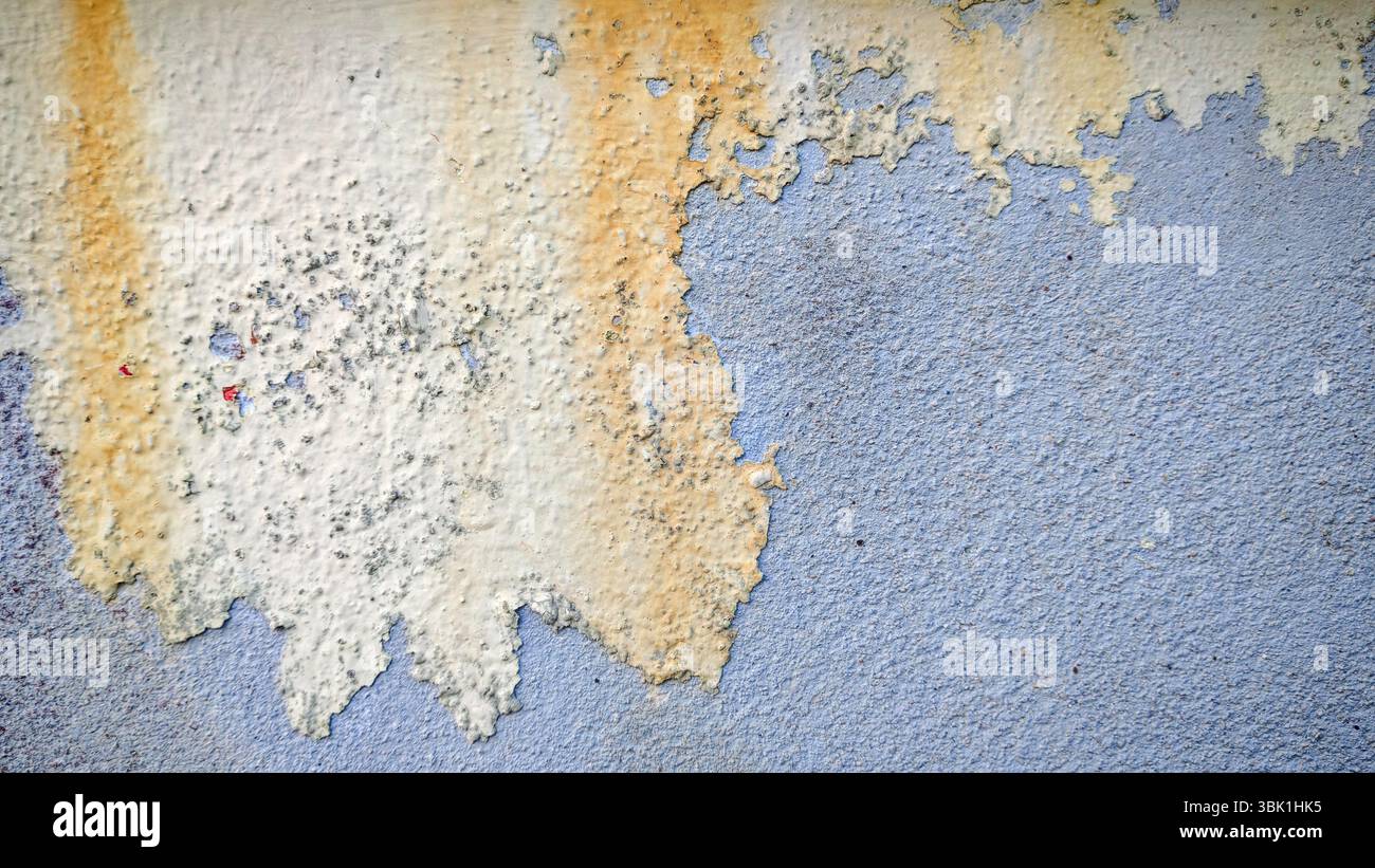 Peeling Paint and Water Stains on Textured Wall Stock Photo - Alamy