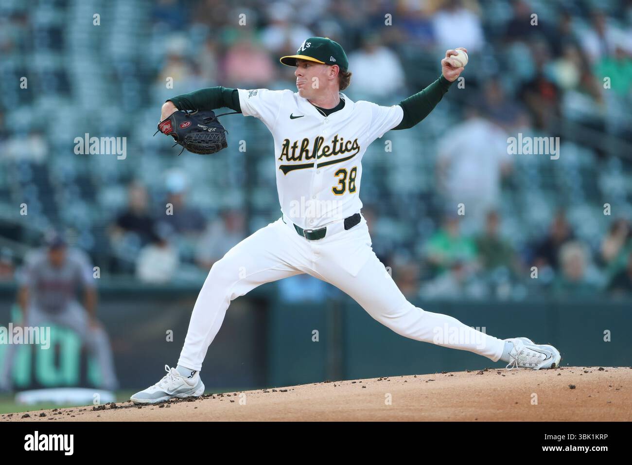 Athletics pitcher JP Sears pitches to a Houston Astros batter during ...