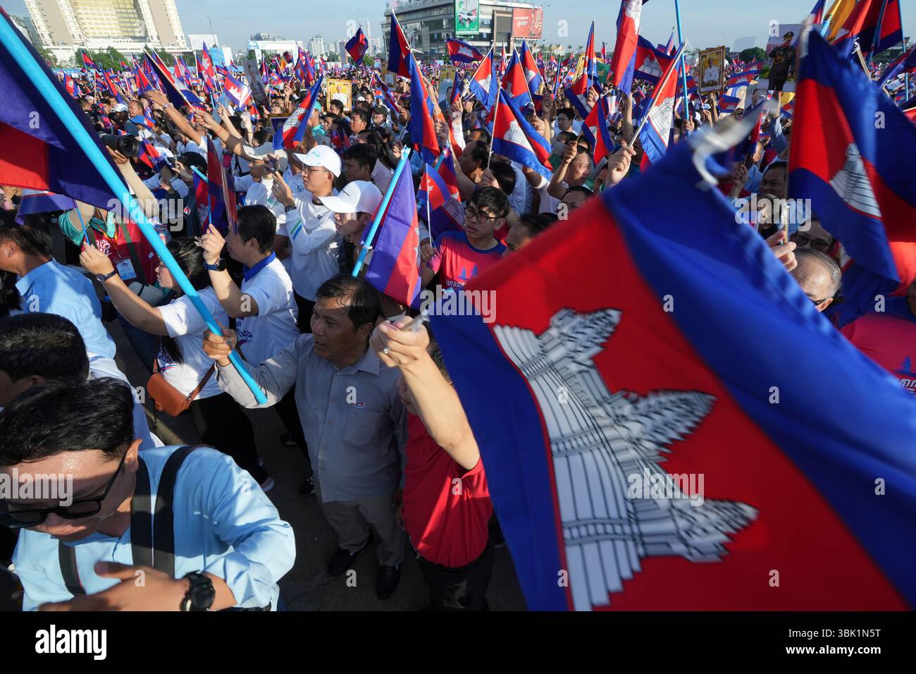 People participate in a government-organized unity parade in support of ...