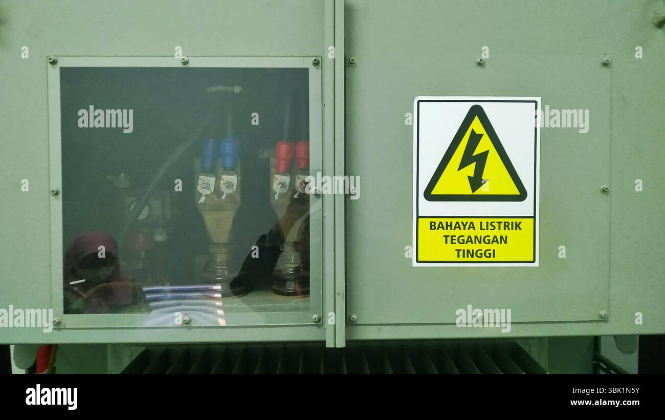A clear warning sign indicating "High Voltage Electrical Hazard" in ...