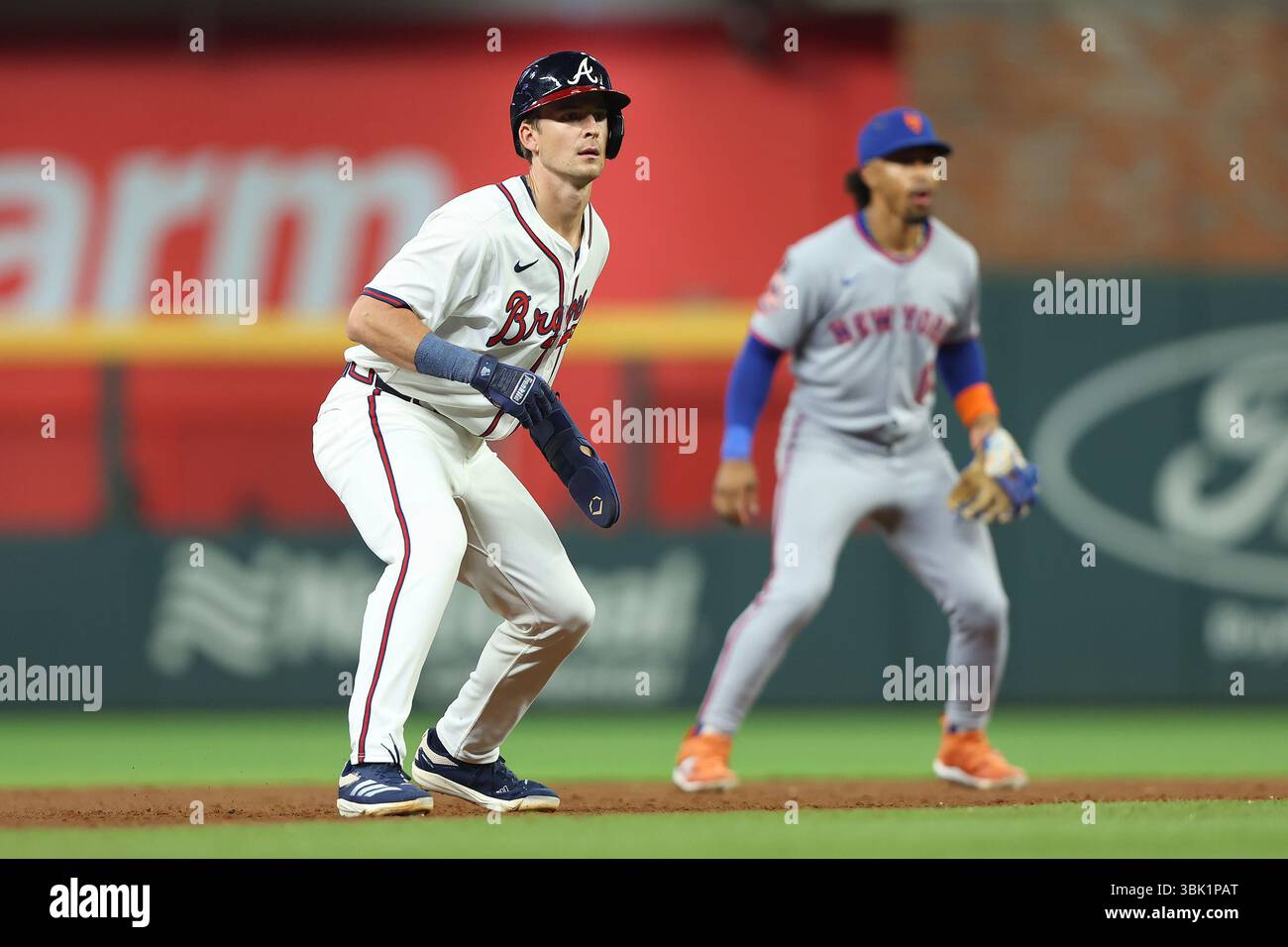 ATLANTA, GA - JUNE 17: Designated runner Luke Williams leads off 2nd ...