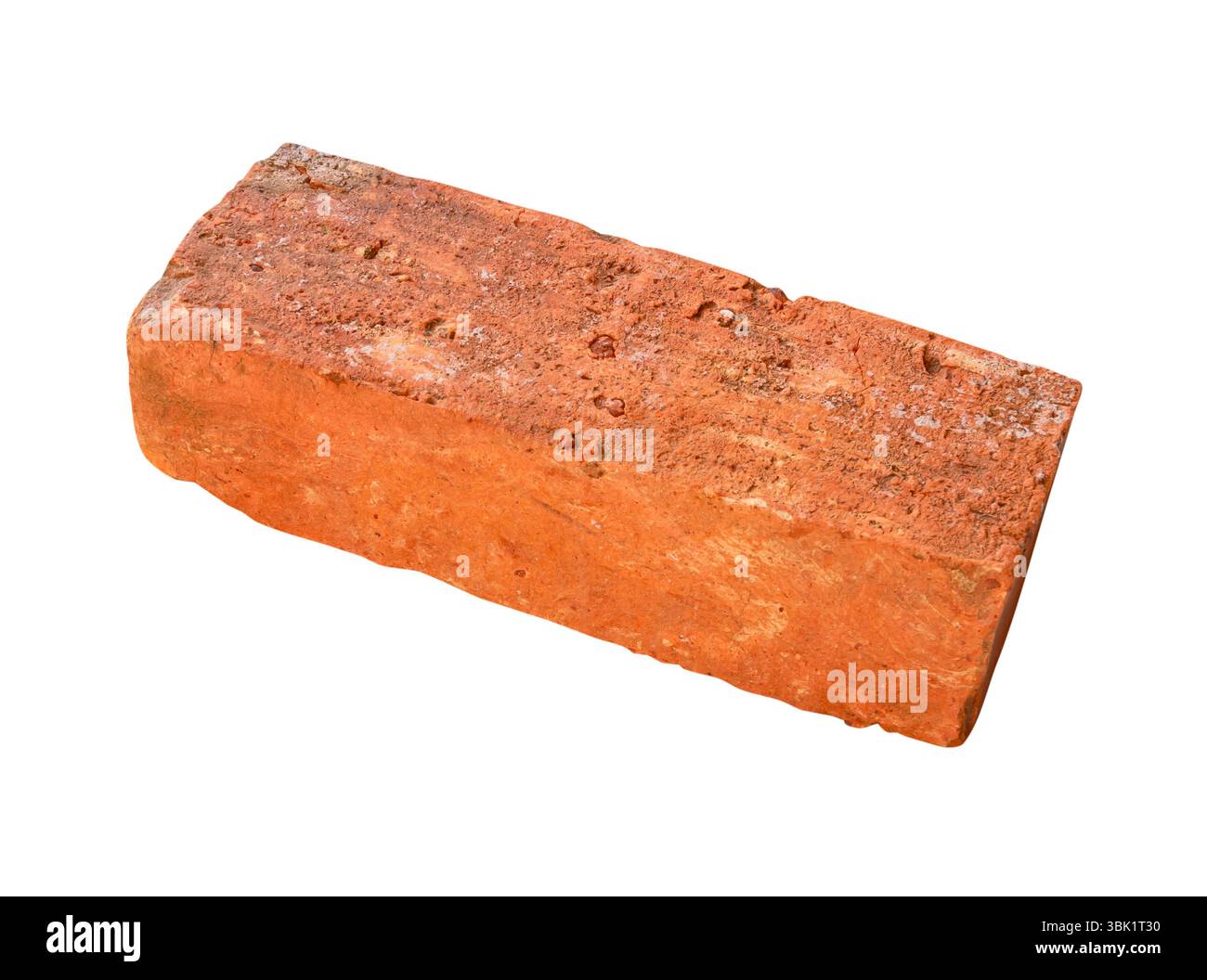 Side view of one cracked old red or orange brick is isolated on white ...