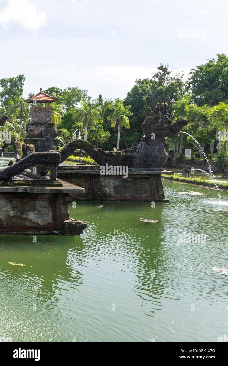 Bali, Indonesia - Dec 19, 2024: Beautiful fountain with two statues of ...