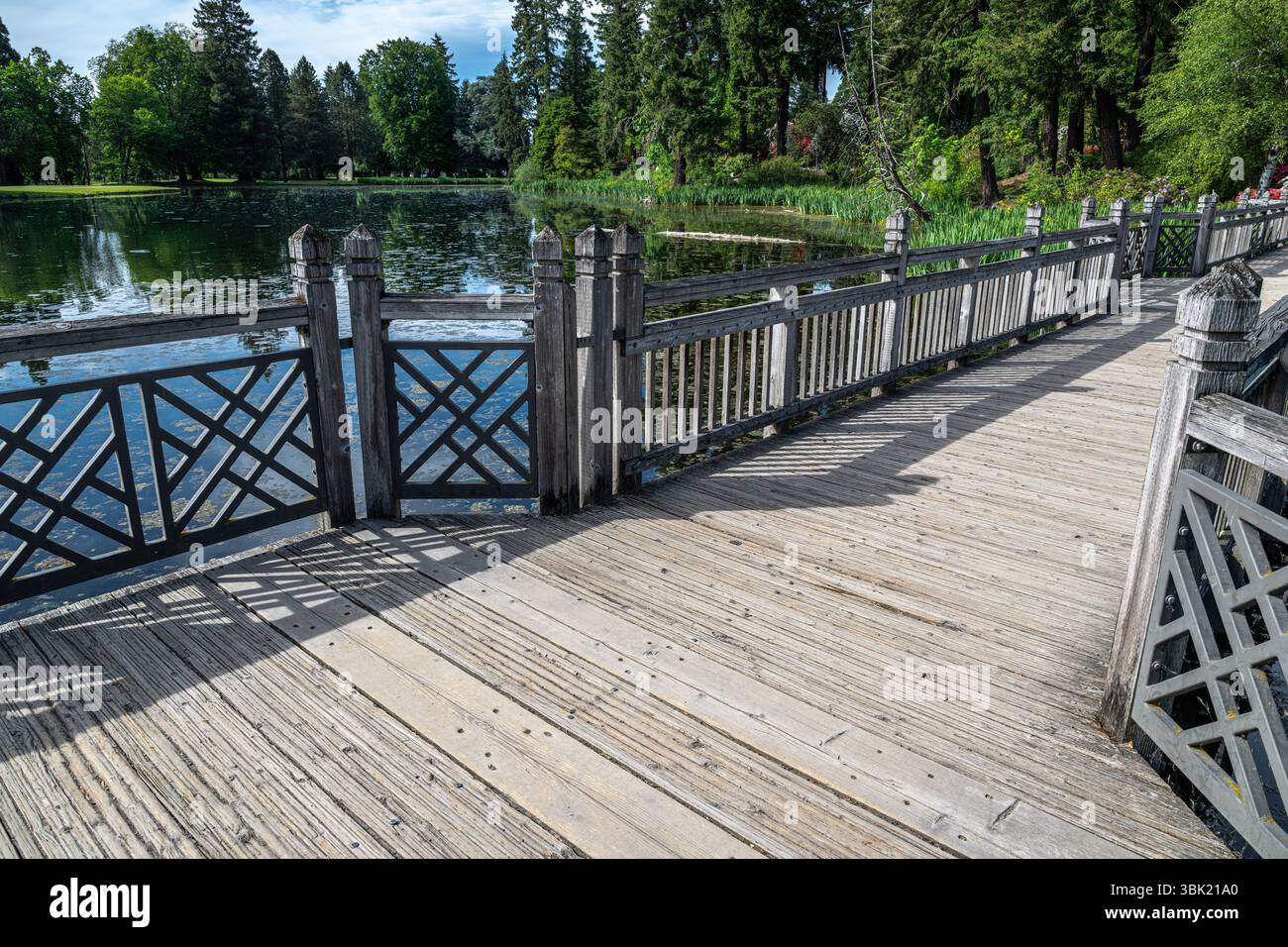 Wooden Bridge over Crystal Springs Lake in Portland, Oregon Stock Photo ...