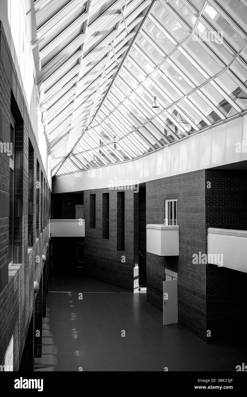 Modern interior of a university building angle shot Stock Photo - Alamy
