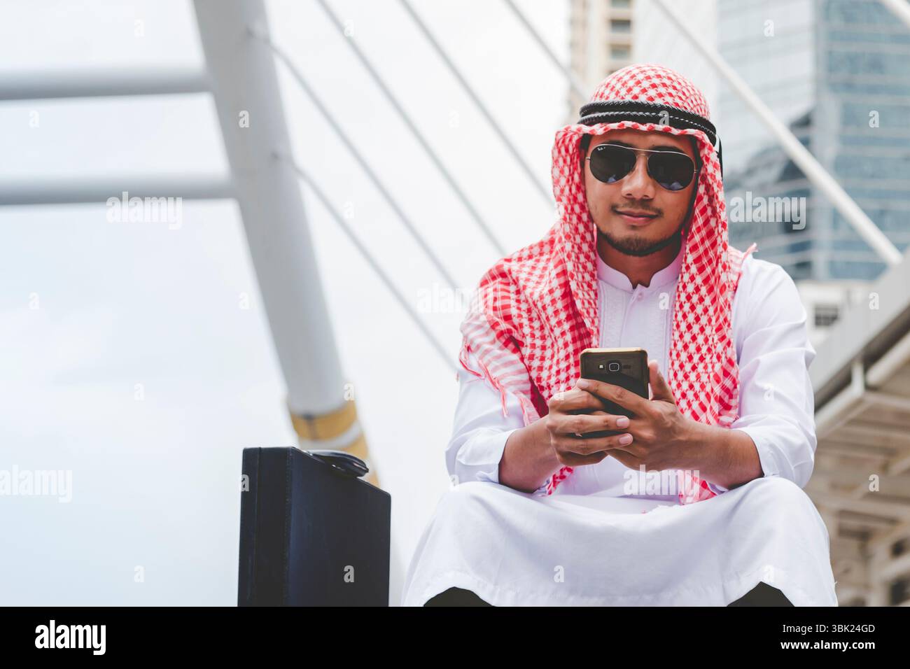 Islamic man using smartphones app organize schedule agenda focus on ...