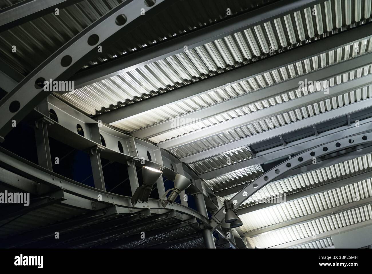 Metal roof structure of a modern building closeup Stock Photo - Alamy