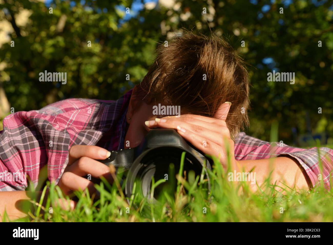 Woman laying on ground hi-res stock photography and images - Alamy