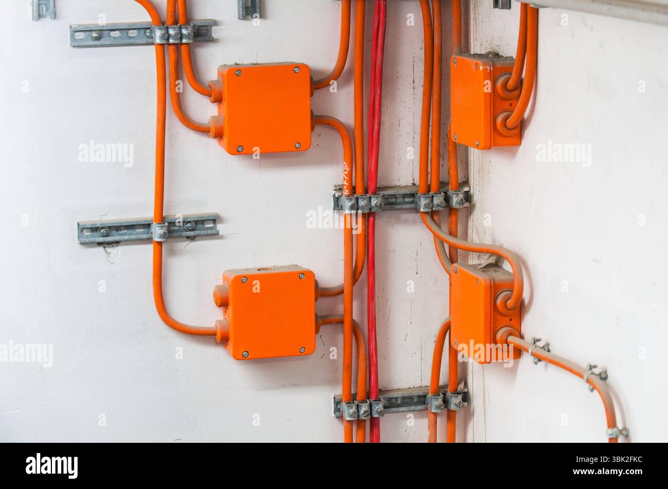 Orange electric wire cable hi-res stock photography and images - Alamy