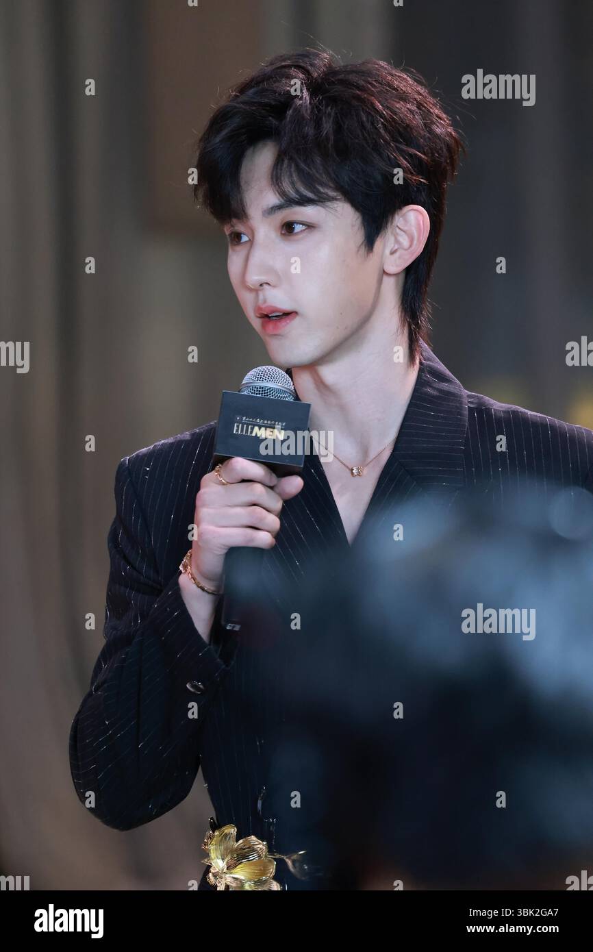 Chinese singer and actor Guo Junchen attends an activity in Shanghai, China, 14 June, 2025 Stock ...