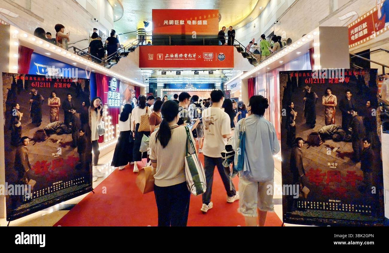 SHANGHAI, CHINA - JUNE 15, 2025 - Fans passed by the official poster of ...