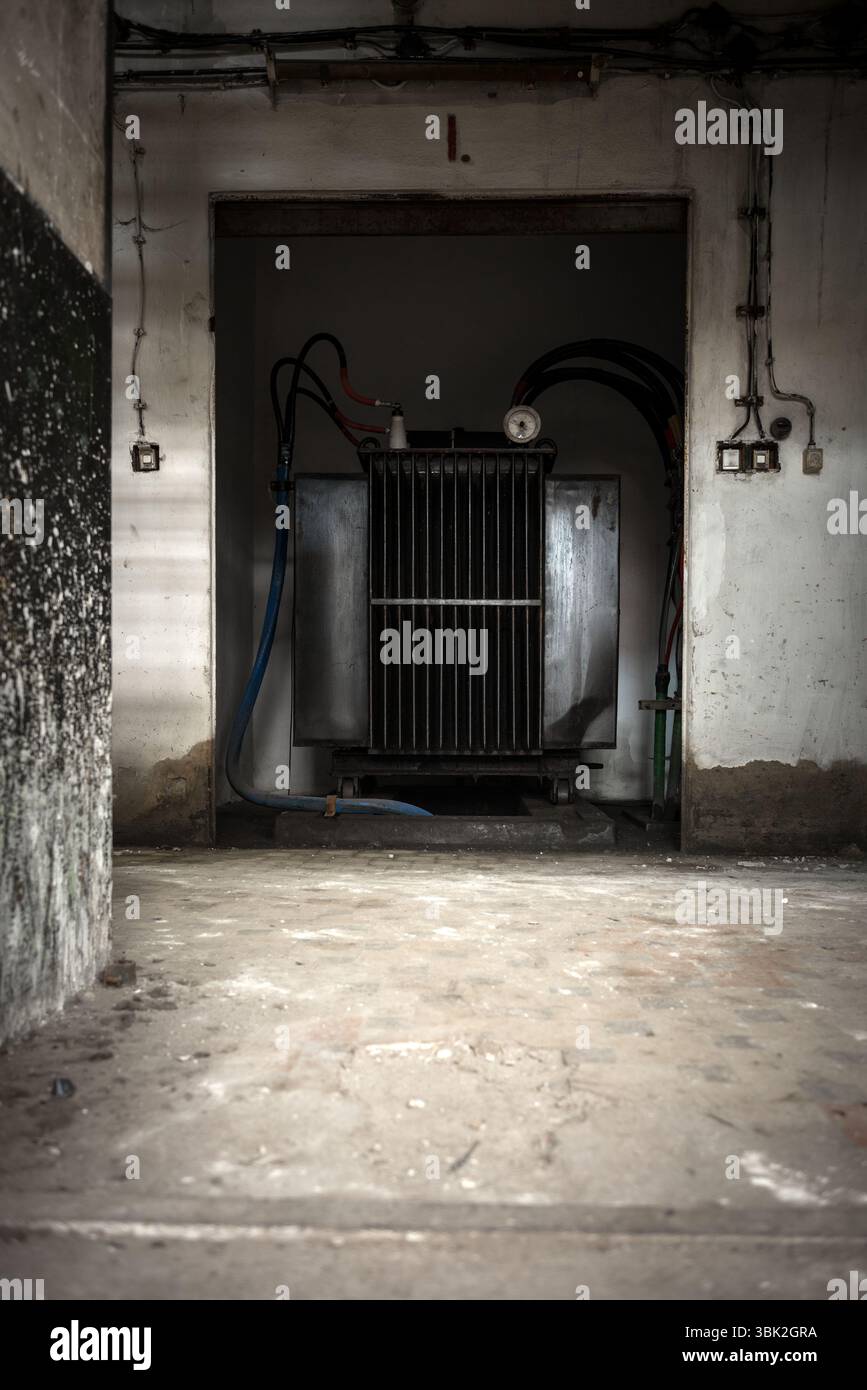 Transformer on the ground in a building Stock Photo - Alamy