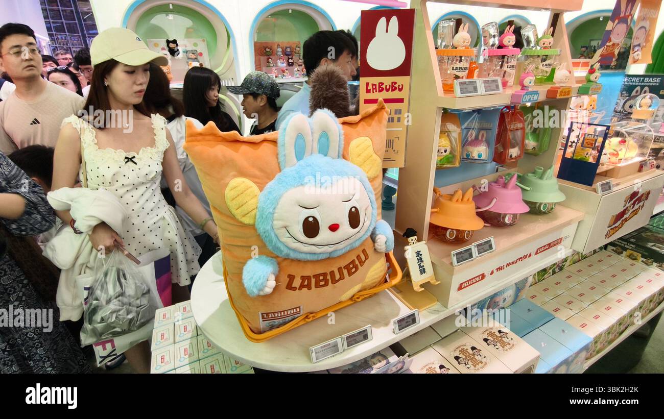 Customers purchase Labubu products in the global flagship store of POP ...
