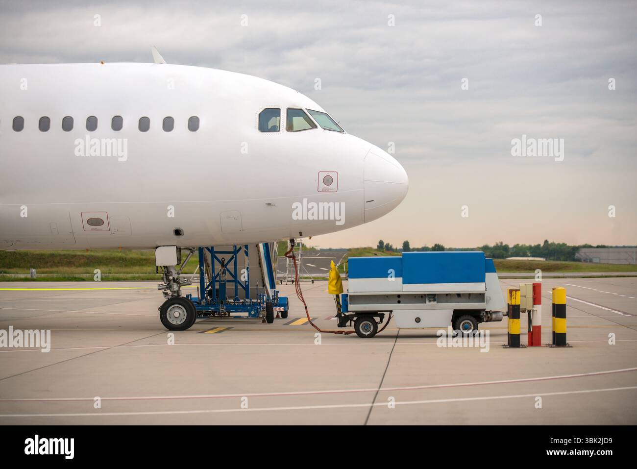 White cargo plane at airport refueling station Stock Photo - Alamy
