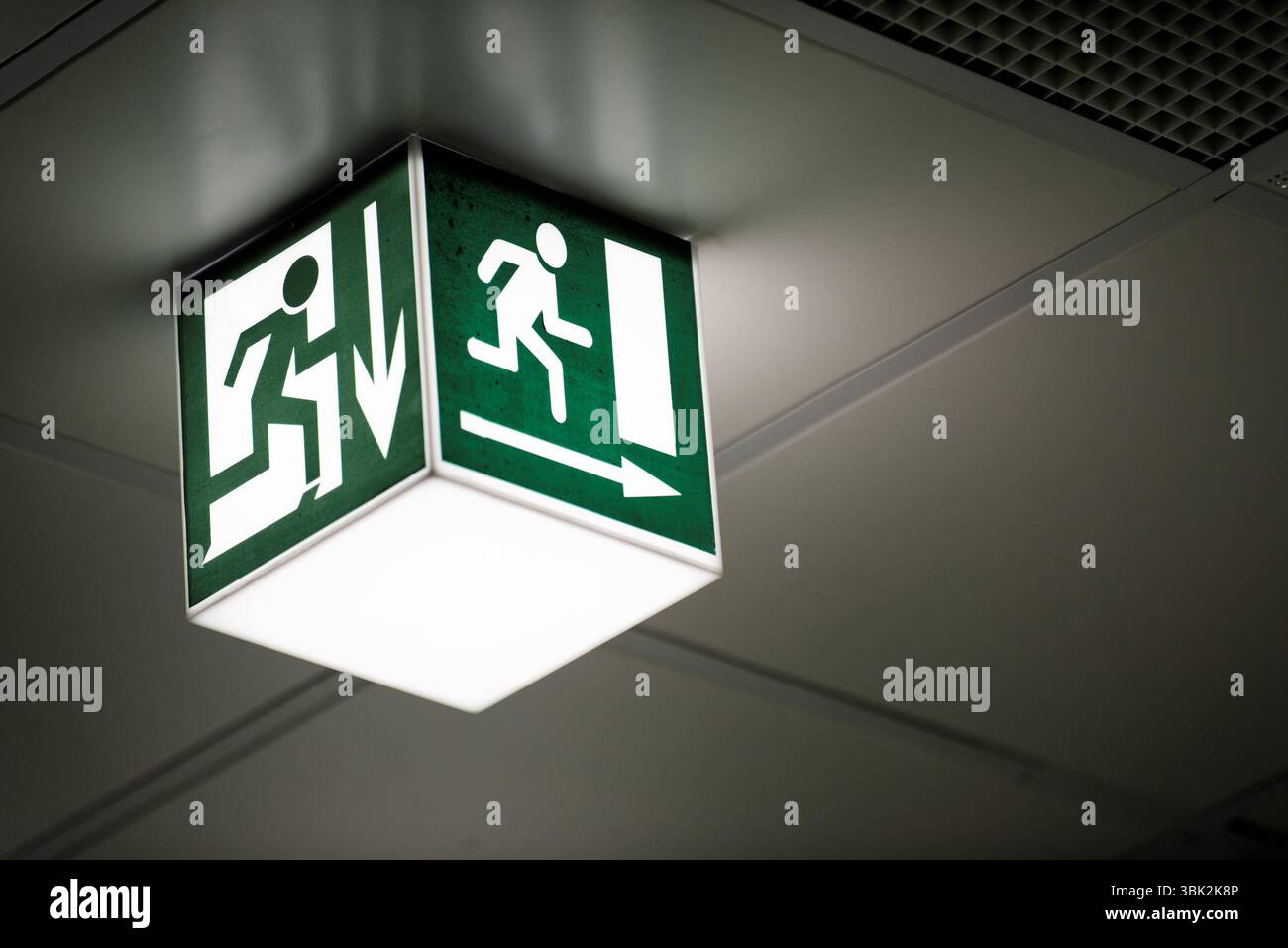 Exit sign hanging on ceiling hi-res stock photography and images - Alamy