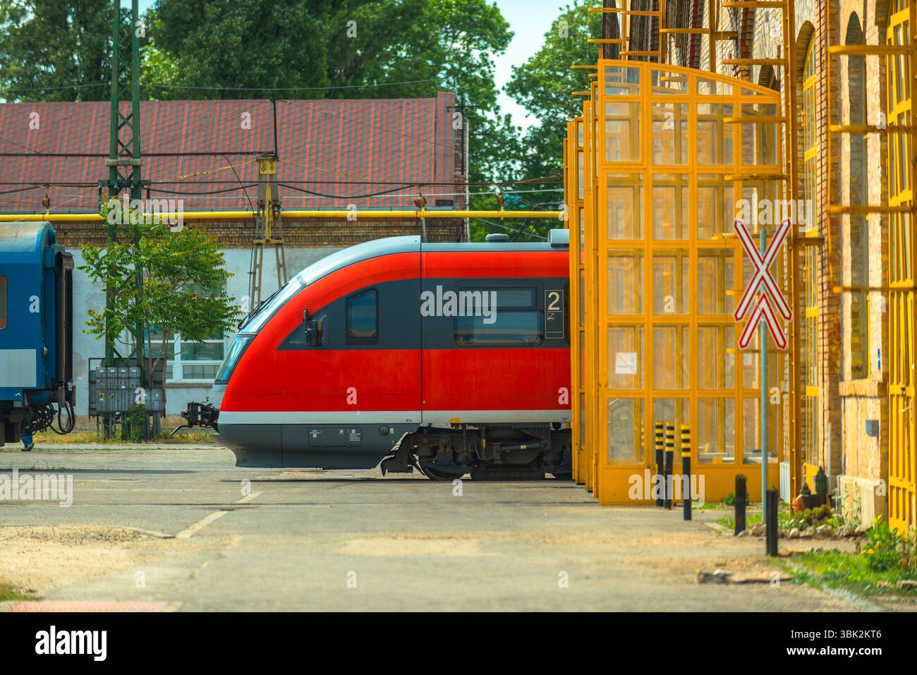 Fast and modern train parking in the garage outdoors Stock Photo - Alamy