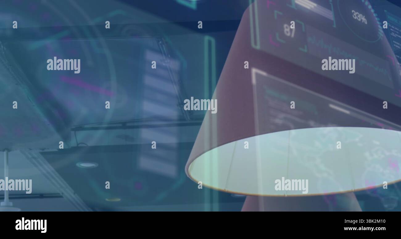 Highlighting modern angled lamp shade casting glow on digital panels inside tech office, copy ...