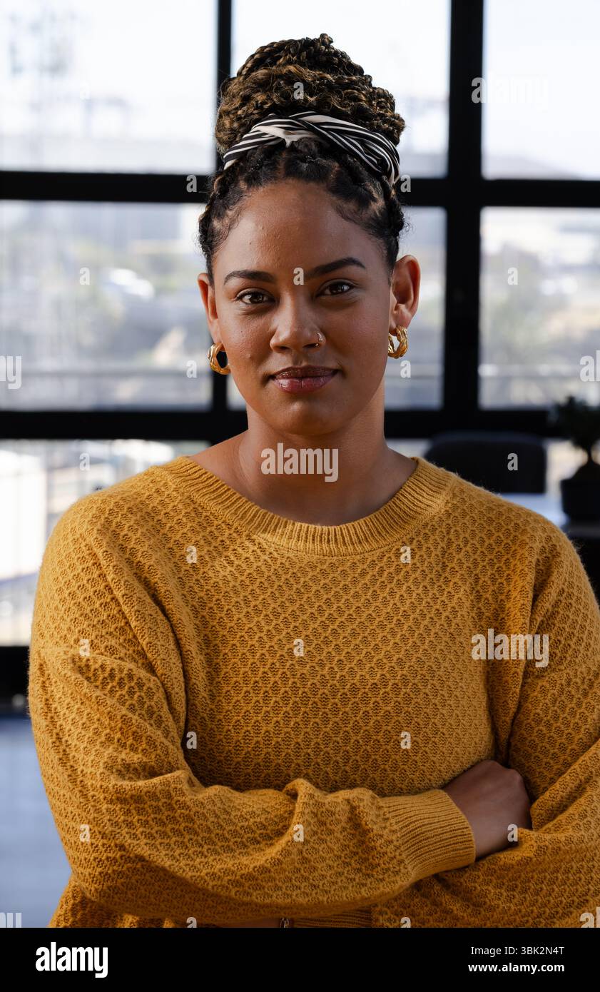Determined female entrepreneur wearing hi-res stock photography and ...