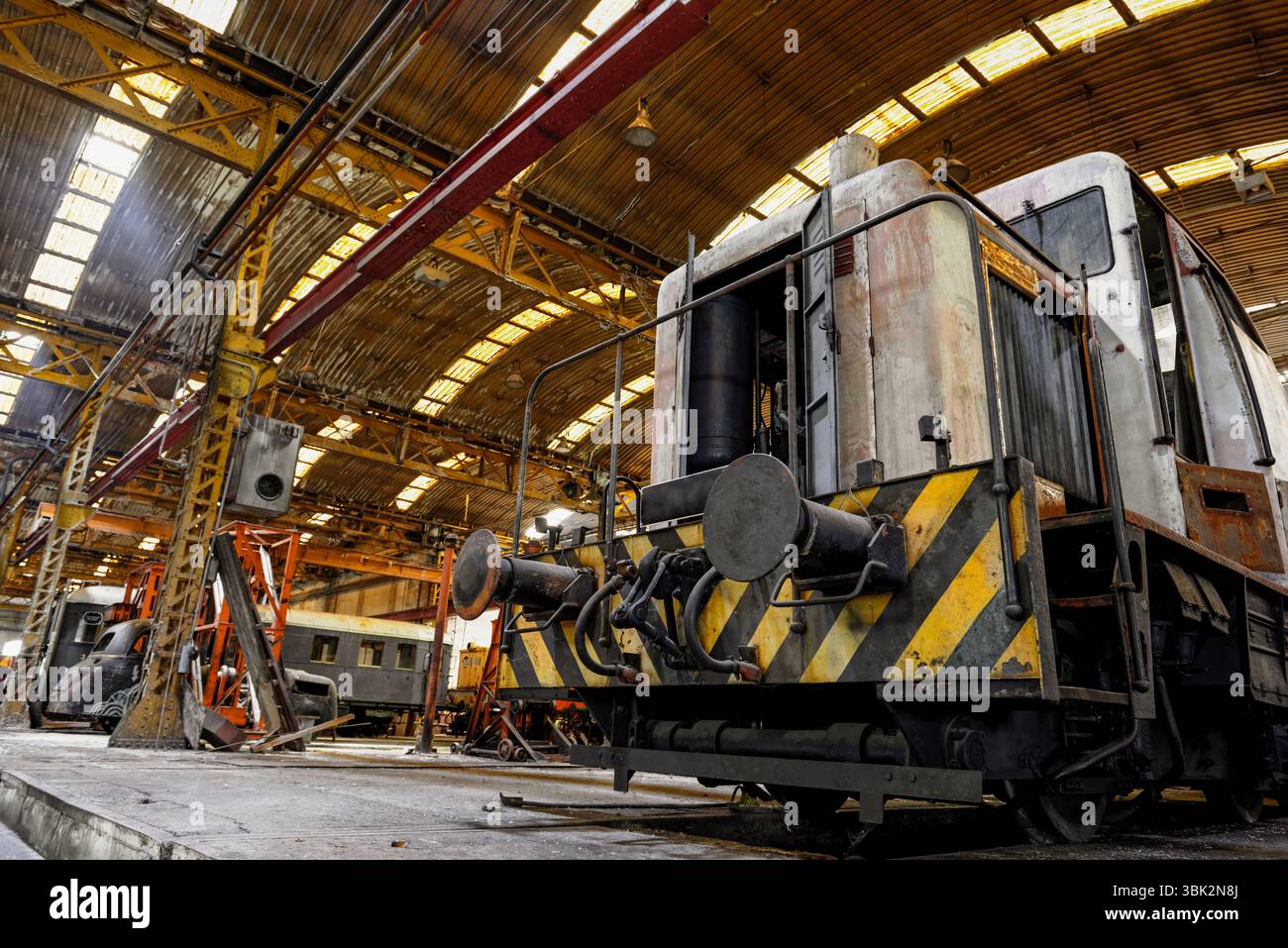 Freight train parking in a garage angle shot Stock Photo - Alamy