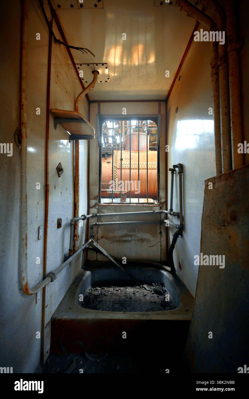 Messy vehicle interior of a train carriage angle shot Stock Photo - Alamy