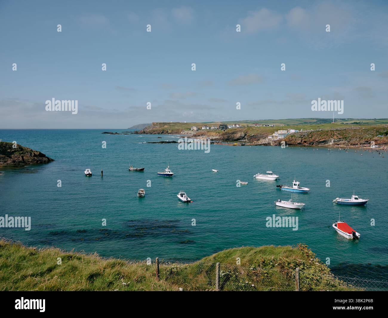 Boats moored in the bay at Bude a seaside town in north Cornwall ...
