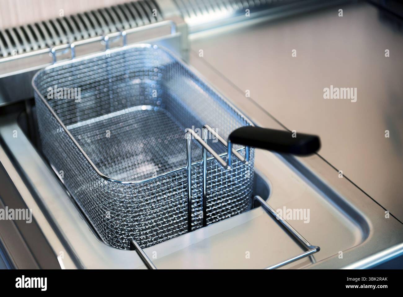 clean deep fryer close up photo in kitchen Stock Photo - Alamy