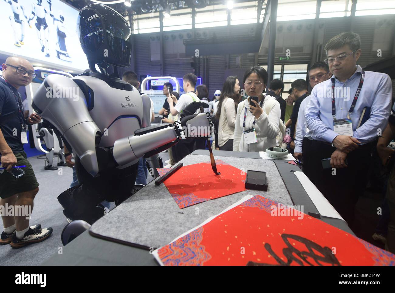 SHANGHAI, CHINA - JUNE 18, 2025 - Audience watched humanoid robots ...