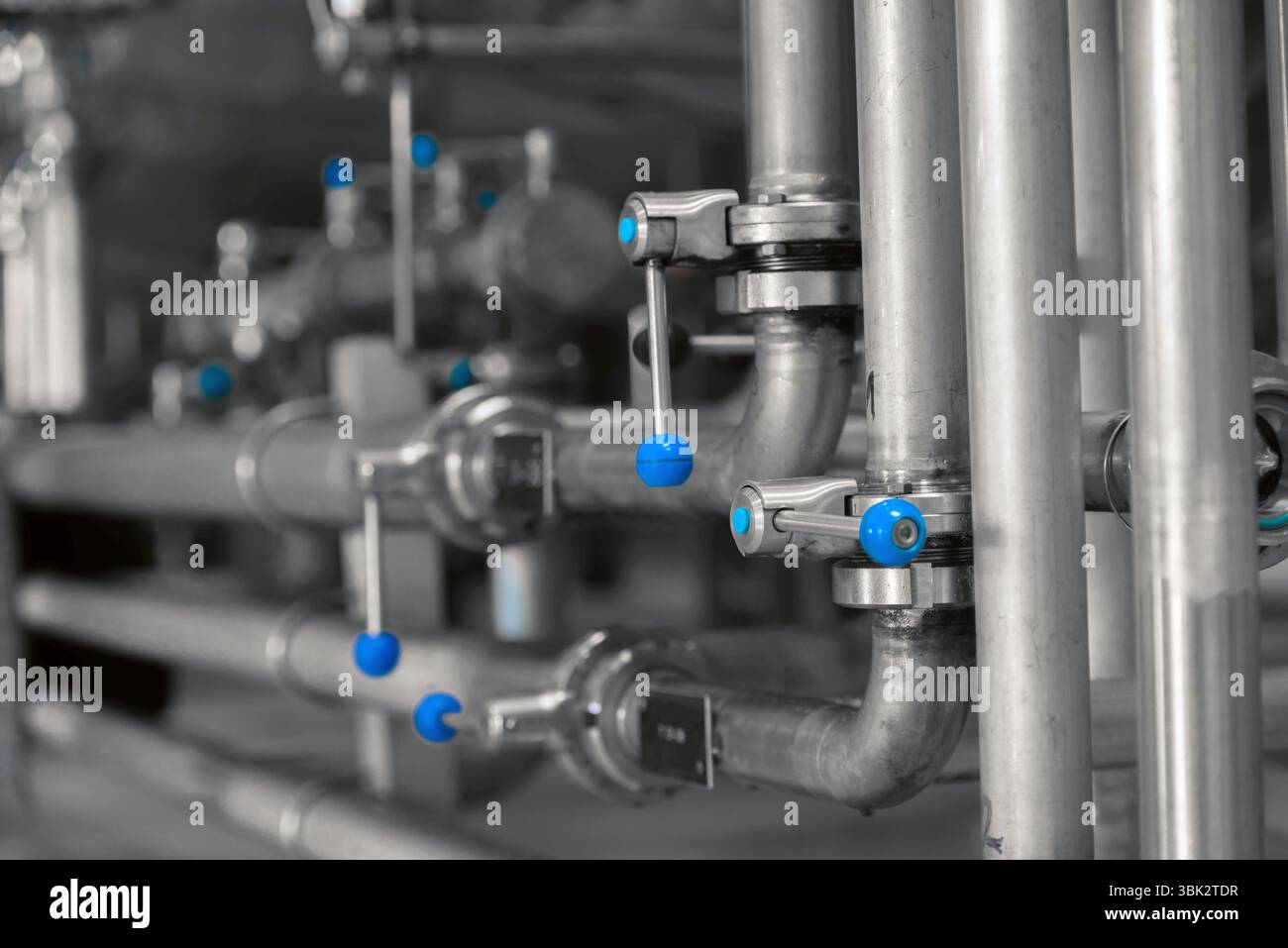 Clean high quality pipeline in industrial interior Stock Photo - Alamy