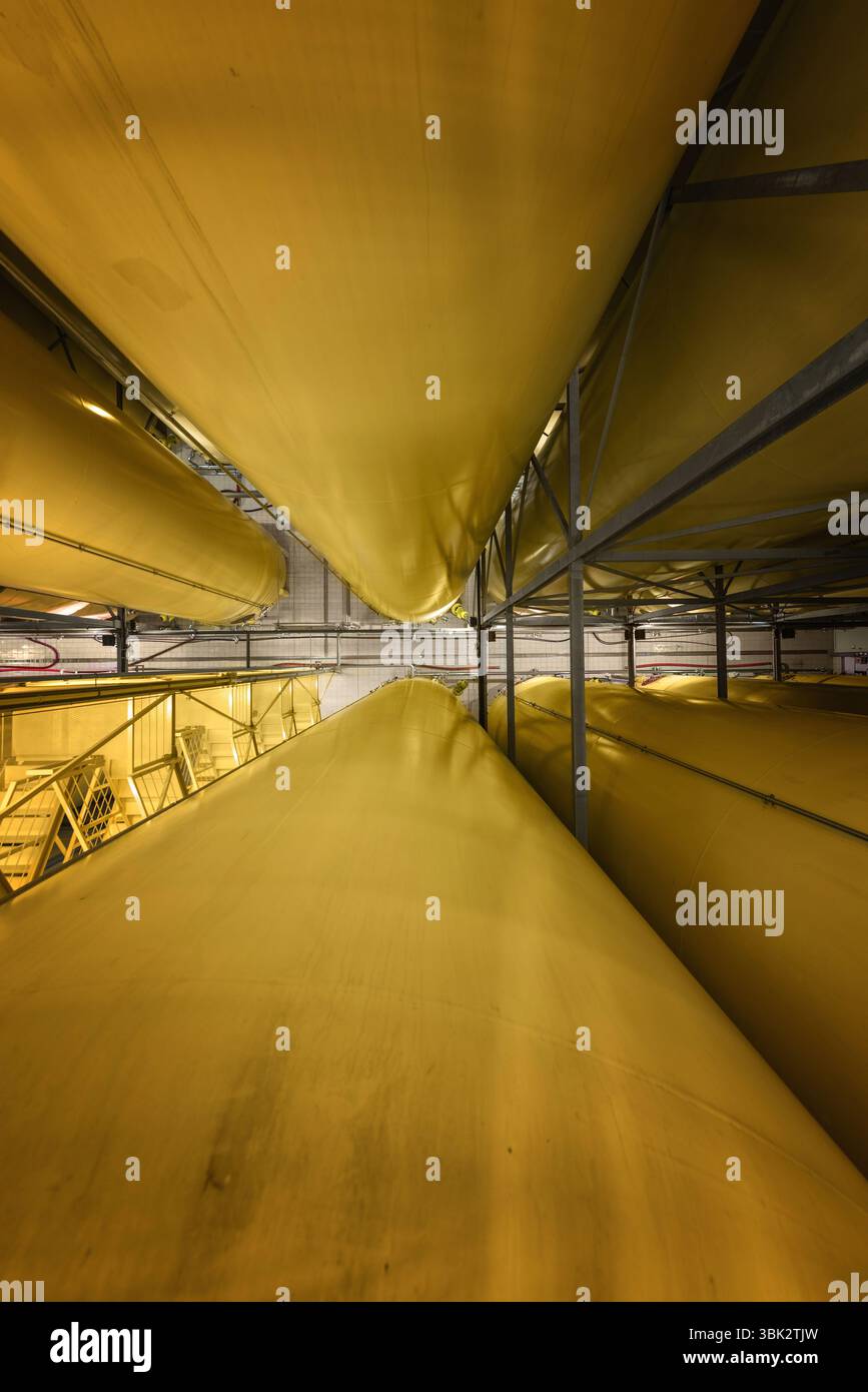Industrial interior with welded silos from above Stock Photo - Alamy