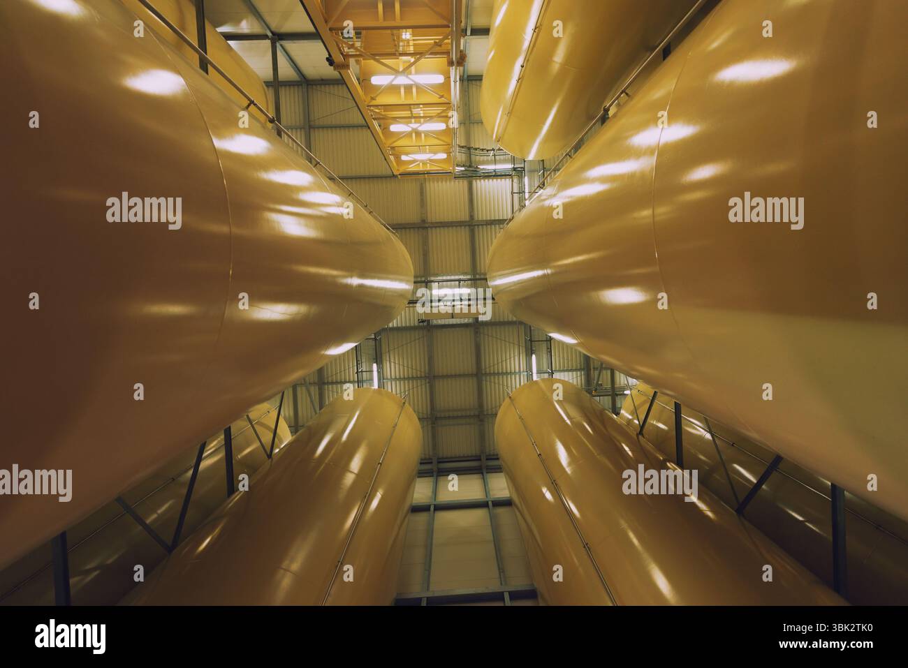 Industrial interior with welded silos from above Stock Photo - Alamy