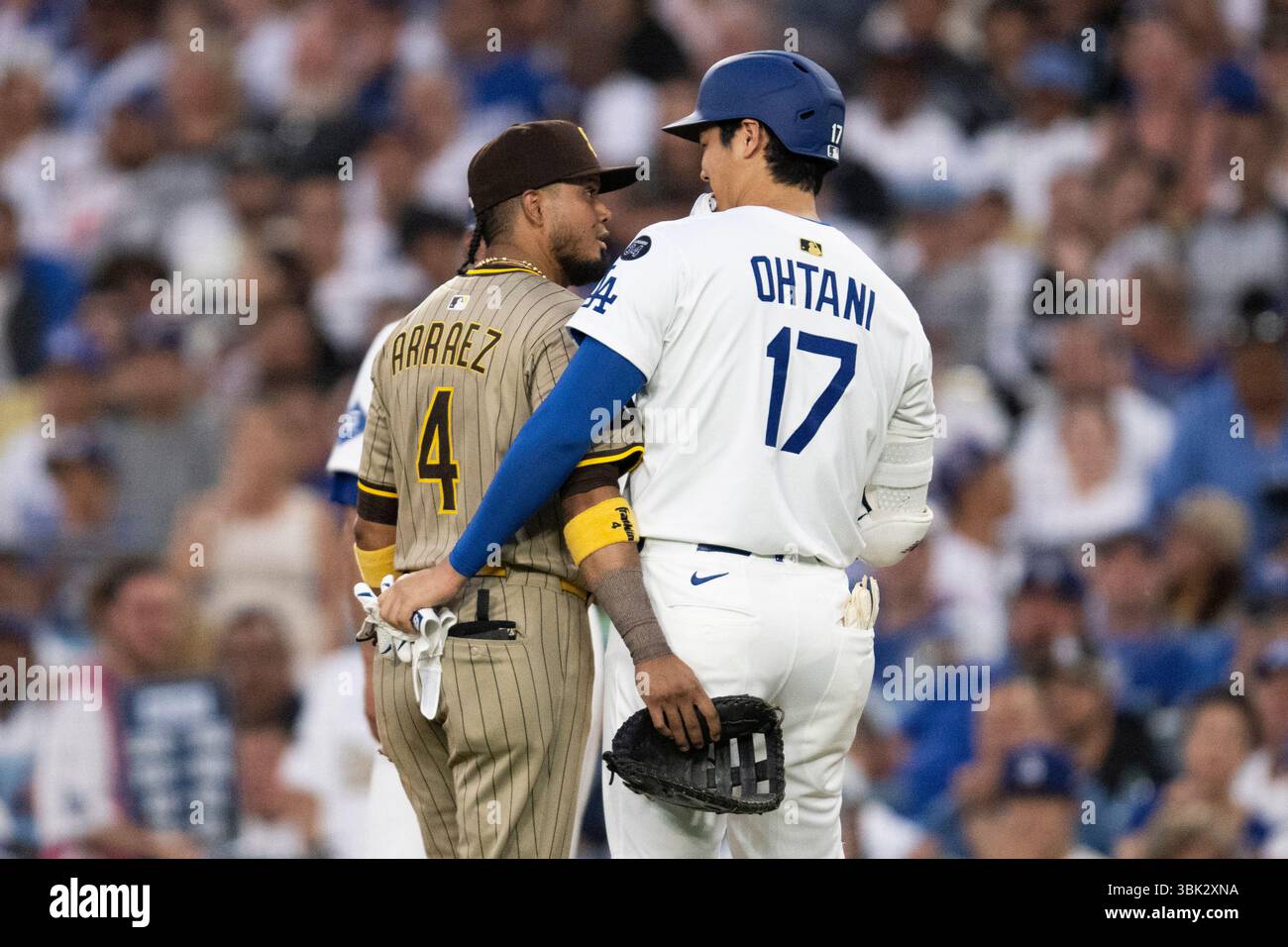 San Diego Padres first baseman Luis Arraez, left, and Los Angeles ...