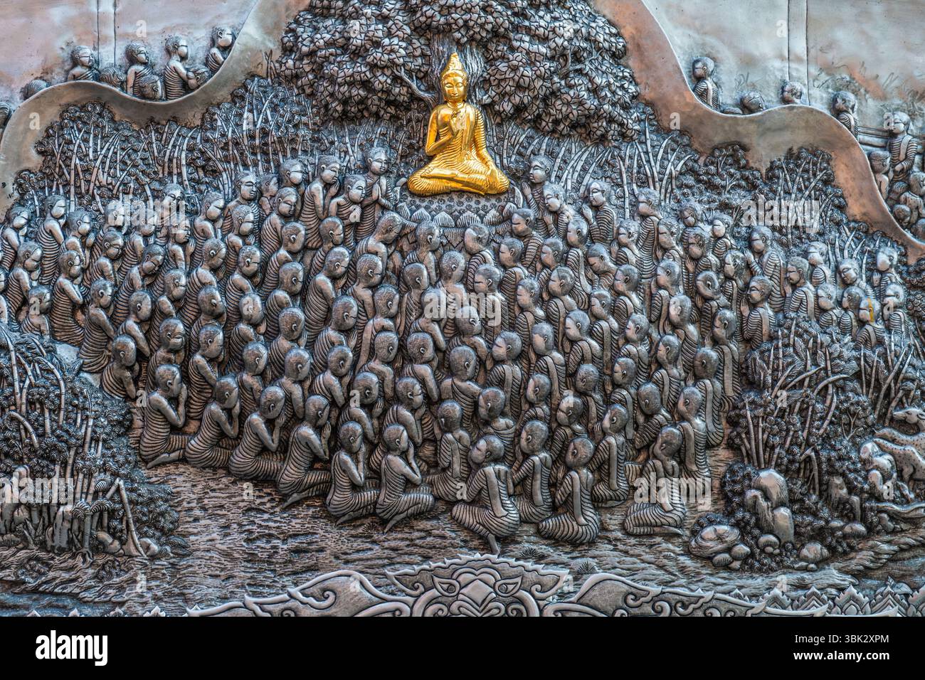 Golden Buddha teaching large group of disciples in detailed silver ...