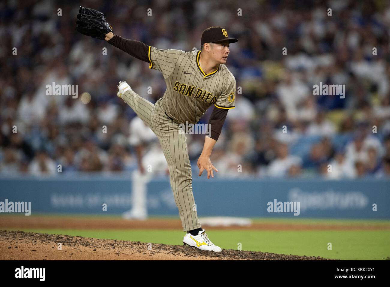 San Diego Padres relief pitcher Yuki Matsui delivers a pitch during a ...