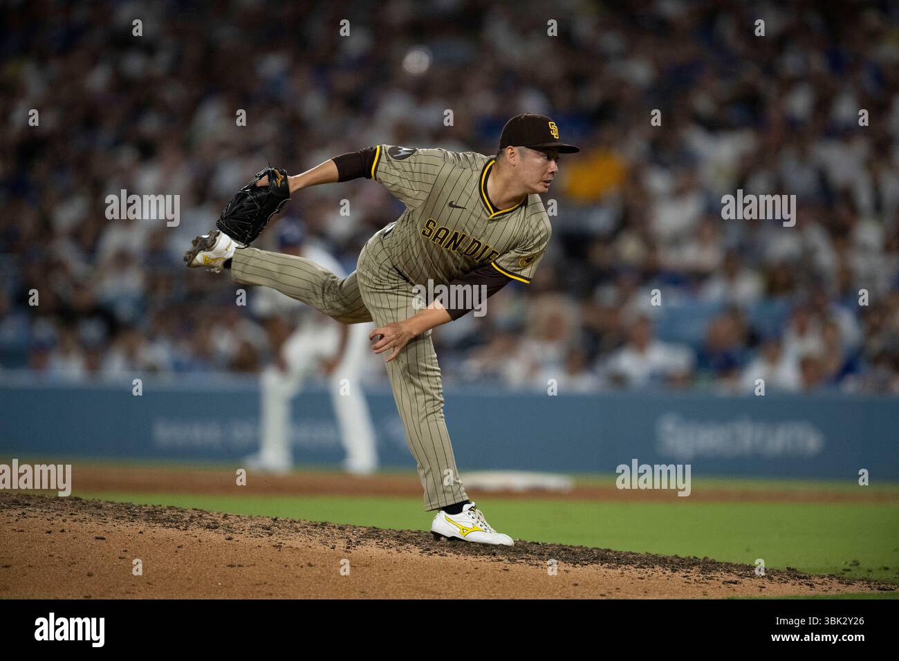 San Diego Padres' relief pitcher Yuki Matsui delivers a pitch during a ...