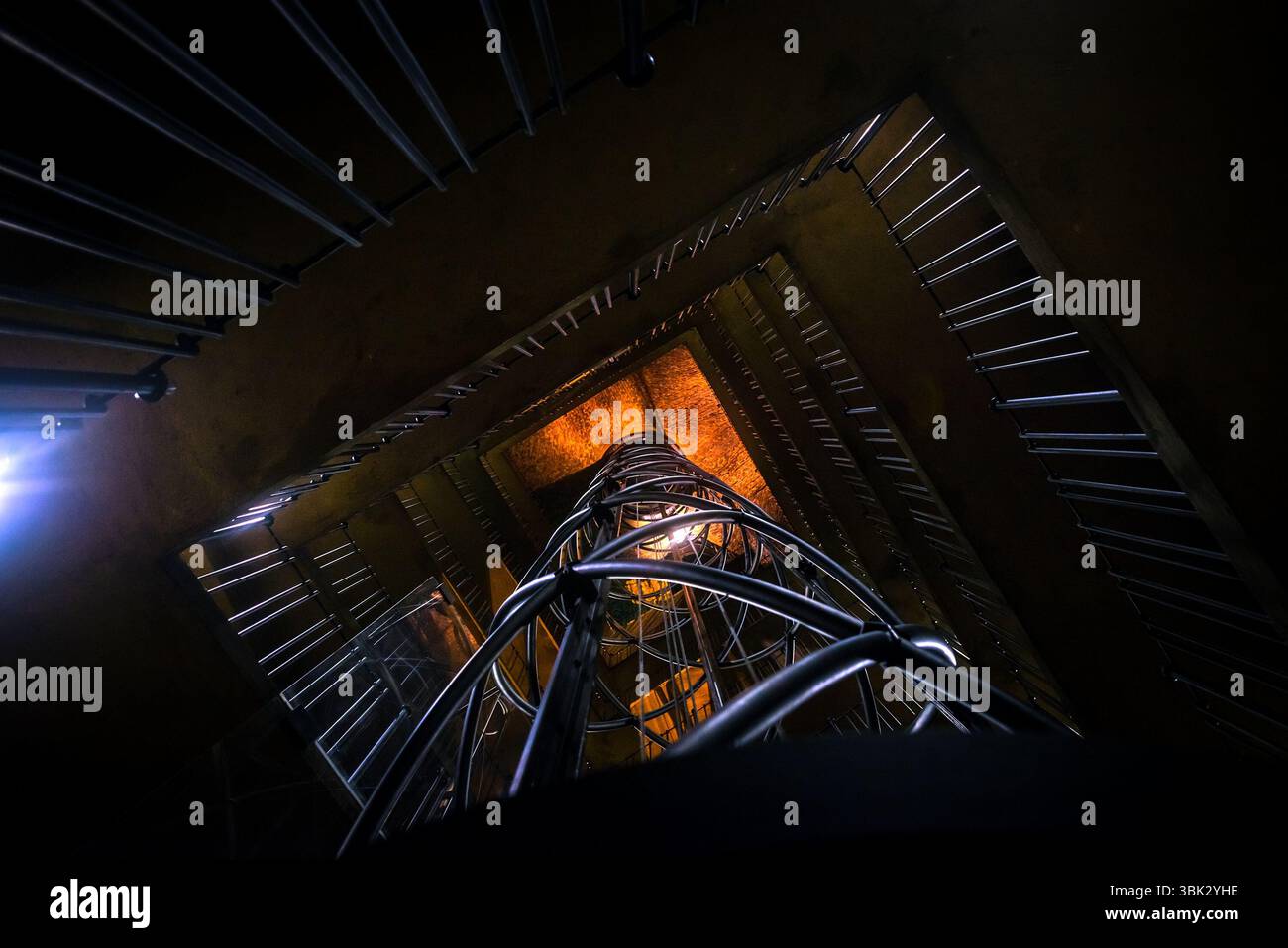 Clock tower interior with elevator angle shot Stock Photo - Alamy