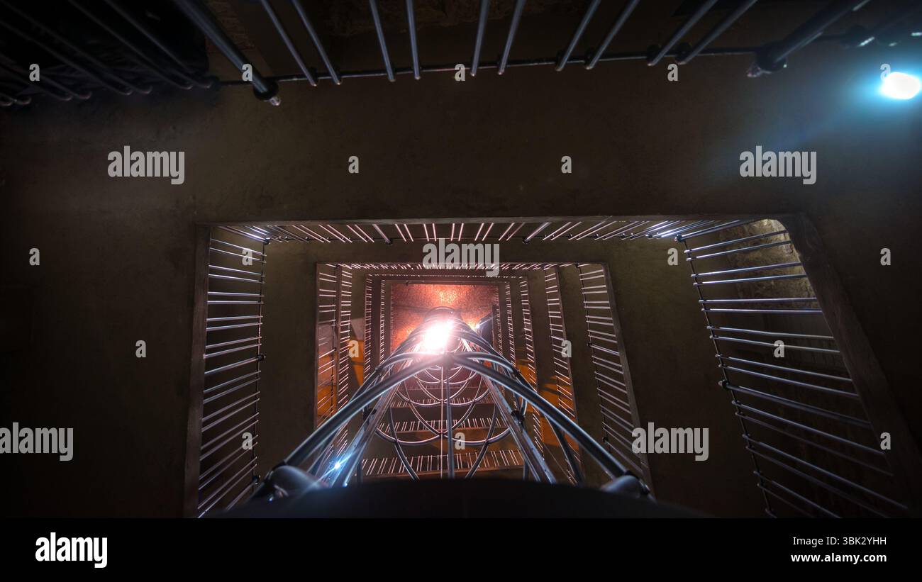 Clock tower interior with elevator angle shot Stock Photo - Alamy