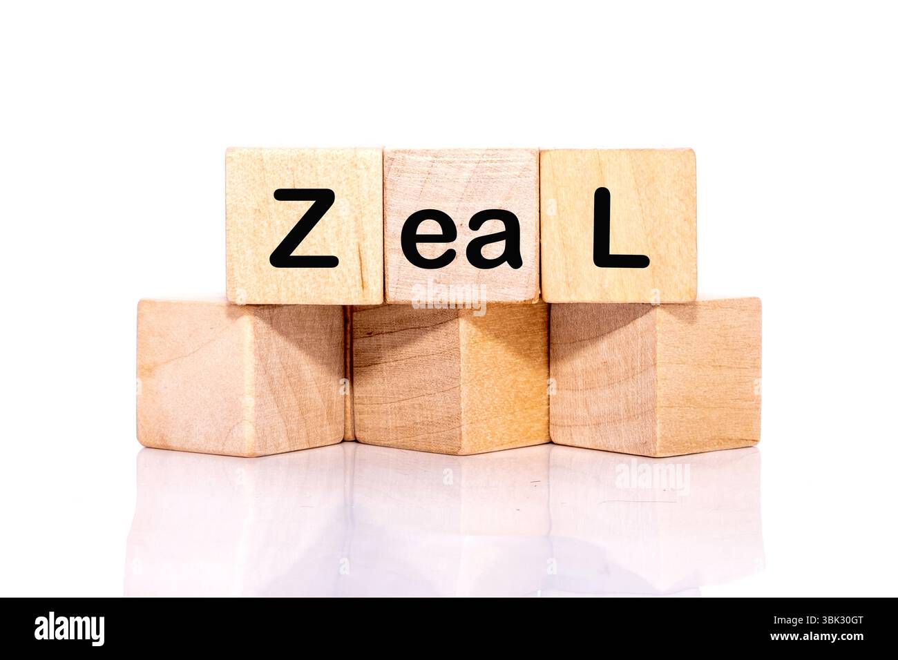 The concept word ZEAL is assembled from wooden cubes. The composition ...