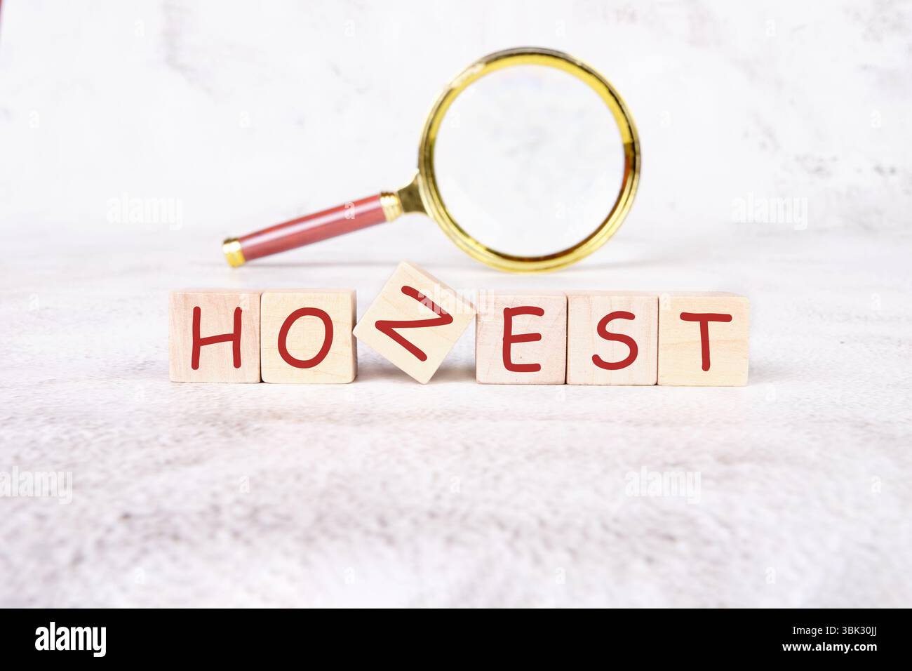 The concept word HONEST is assembled from cubes. Business integrity ...