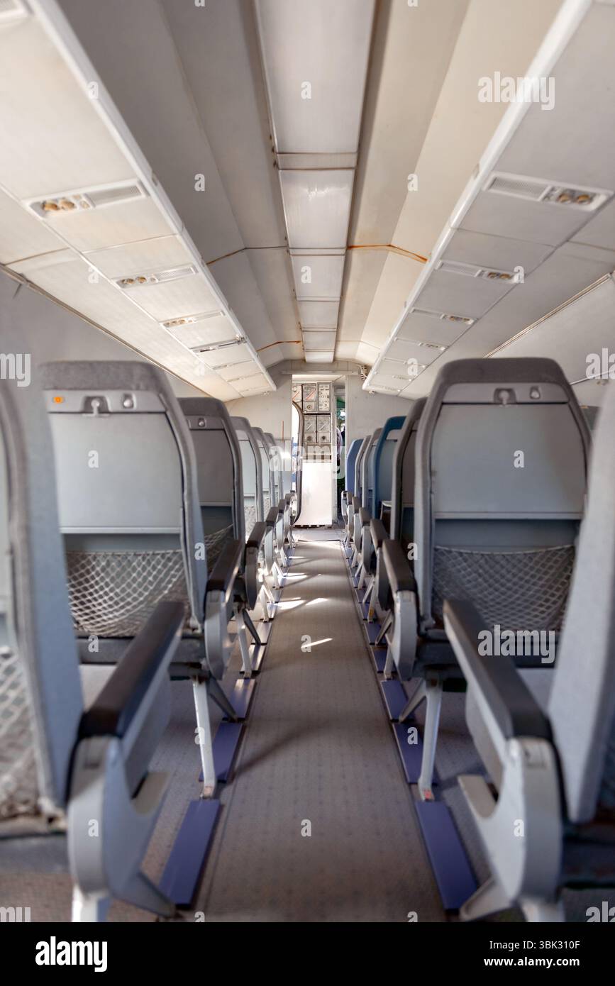 Interior of an airplane with many empty seats Stock Photo - Alamy