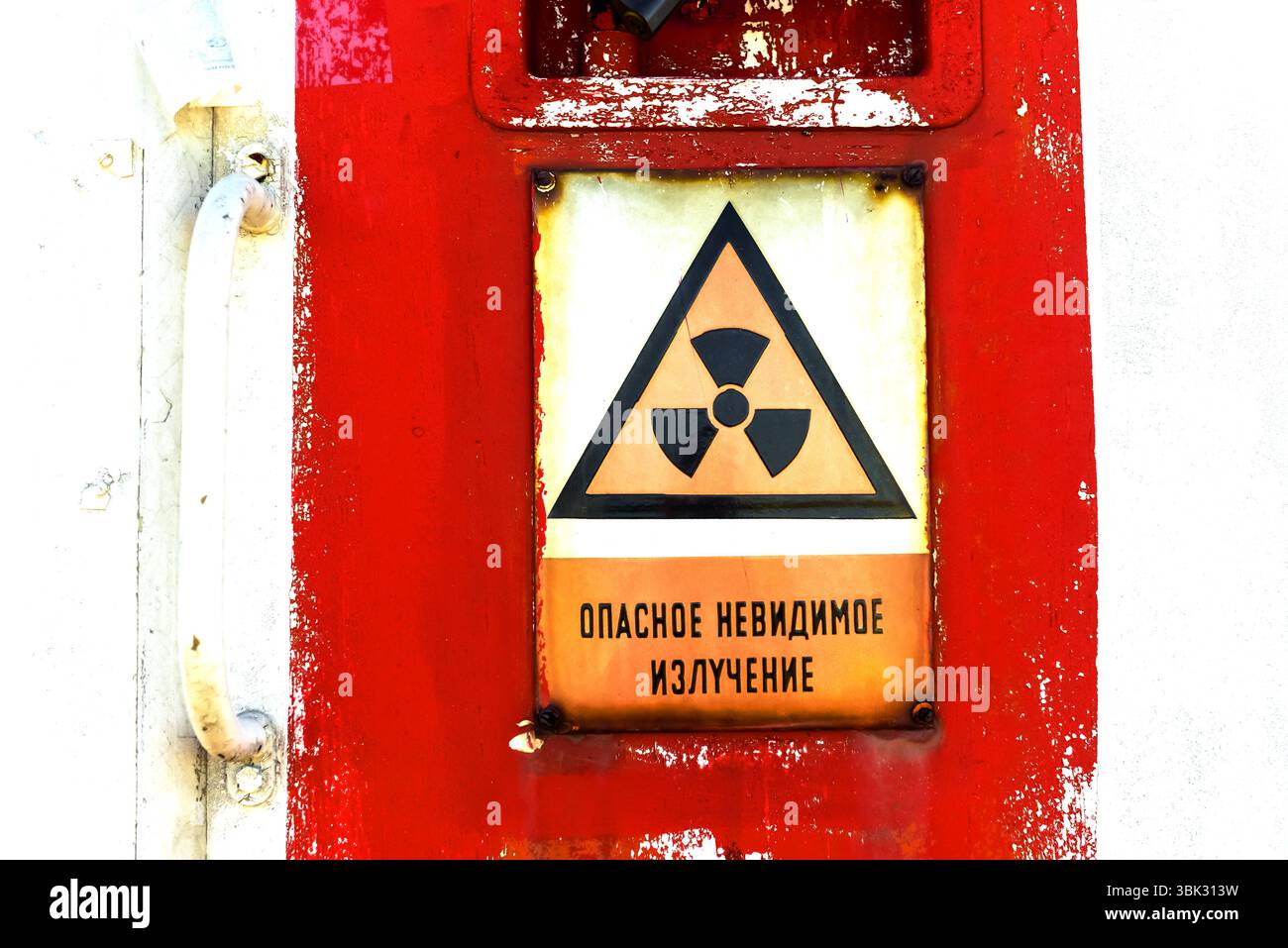Radioactivity sign on a shelter door closeup Stock Photo - Alamy