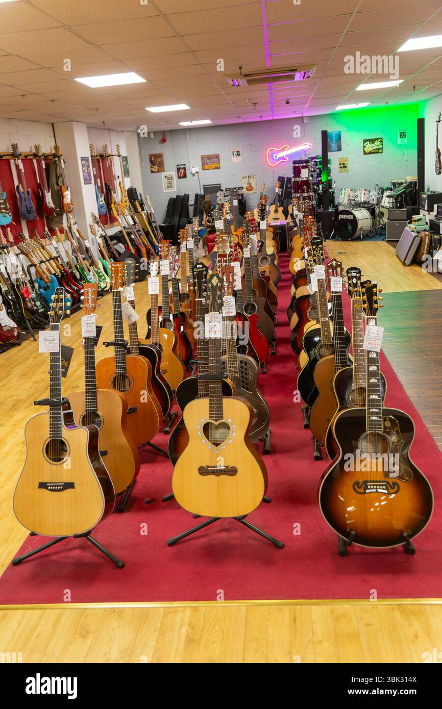 Guitars on display inside shop Sarum Guitars & Drums, Salisbury ...