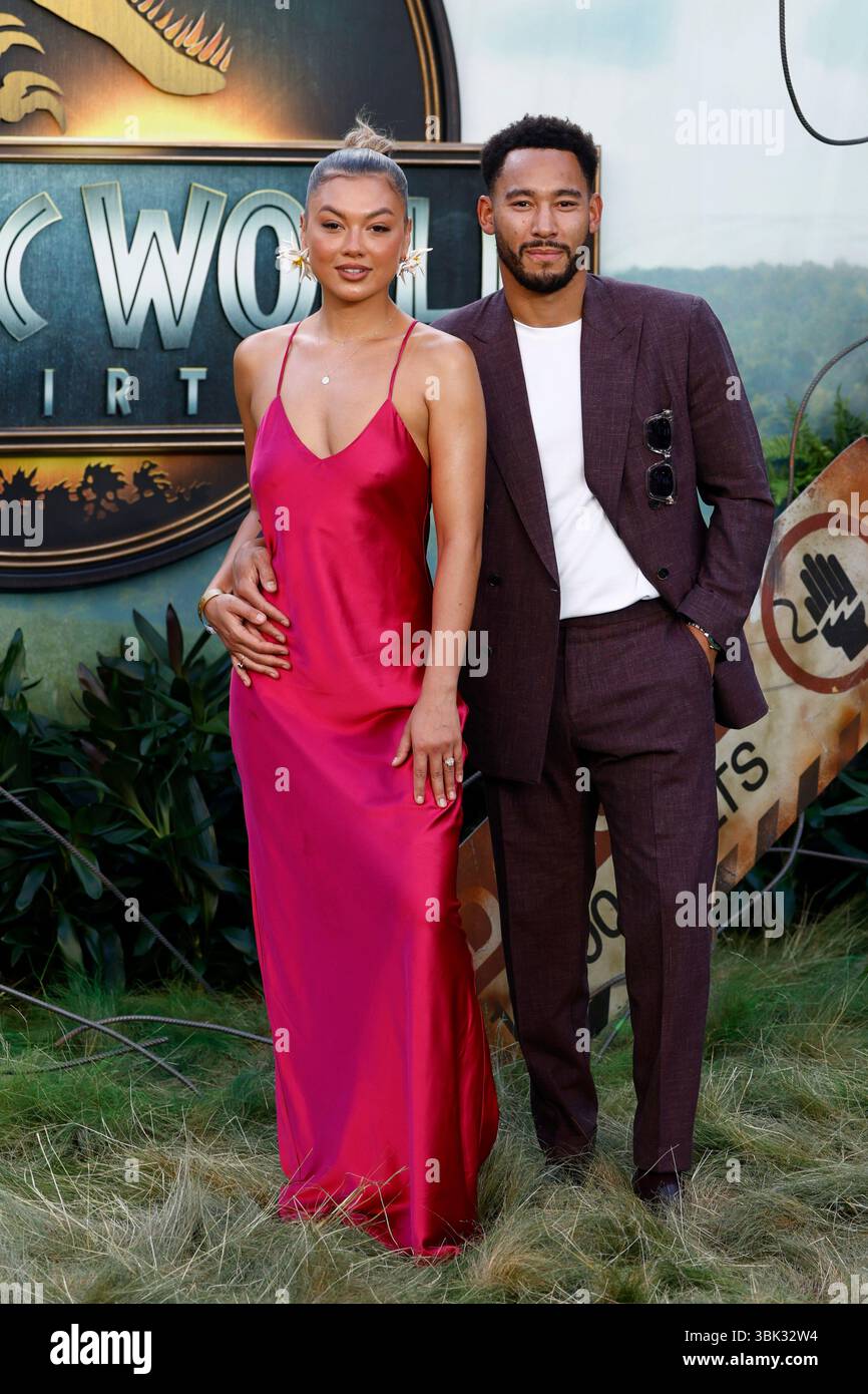 Ruby Wong, left, and Josh Denzel pose for photographers upon arrival at ...