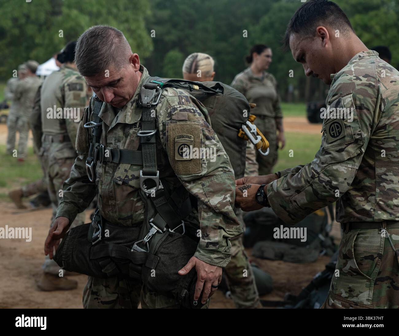 A Paratrooper from the 82nd Airborne Division receives a jumpmaster ...